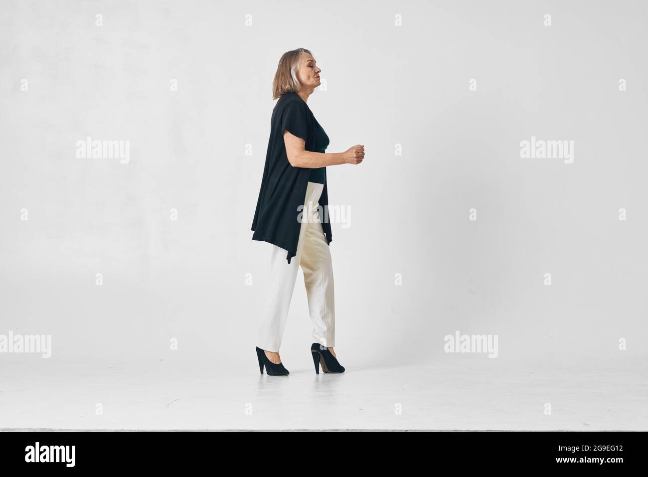 cheerful old woman in full growth movement dance lifestyle Stock Photo ...