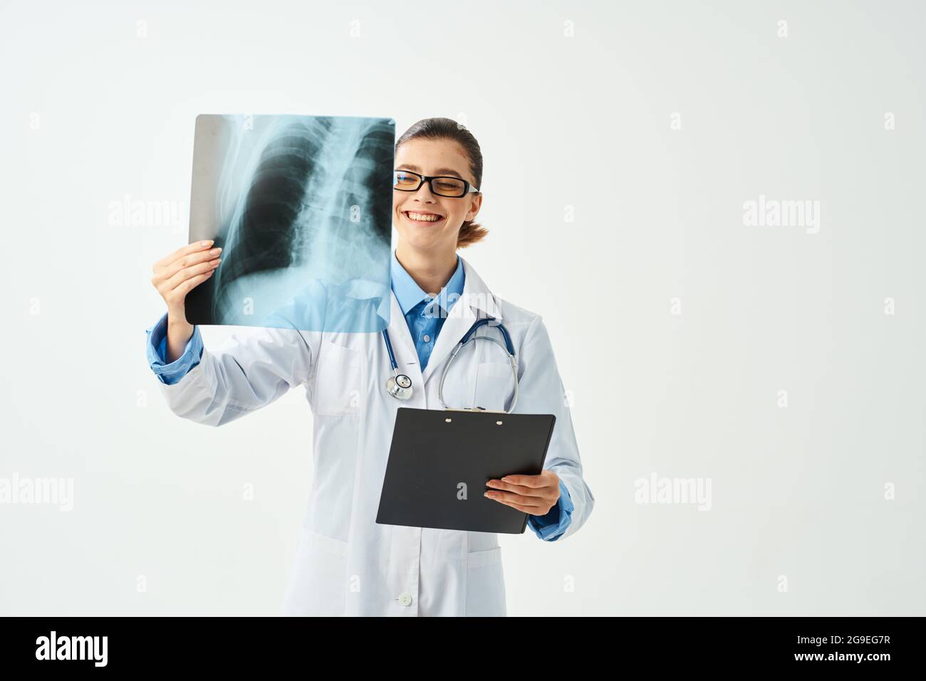 female doctor in white coat and medicine hospital examination Stock ...