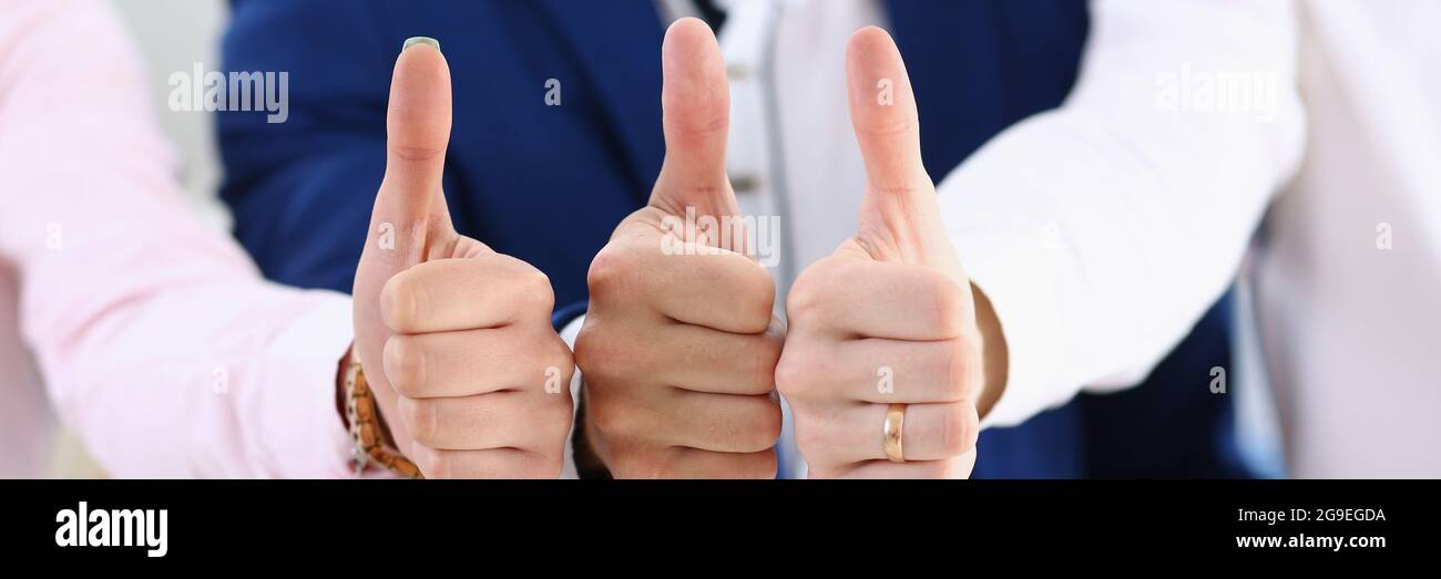 Group of people show OK or approval with thumb up Stock Photo - Alamy