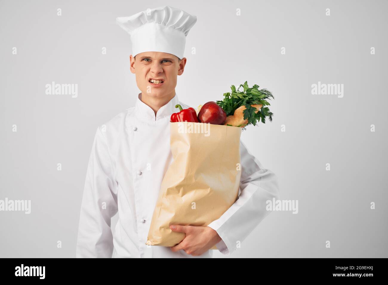 male chef with food package healthy food kitchen Stock Photo - Alamy