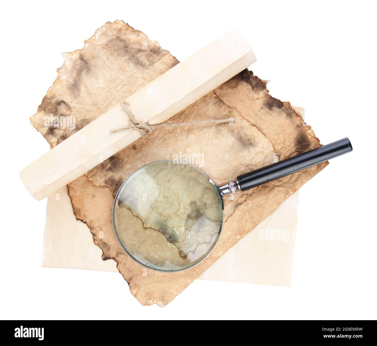 Old paper with magnifying glass isolated on white Stock Photo - Alamy