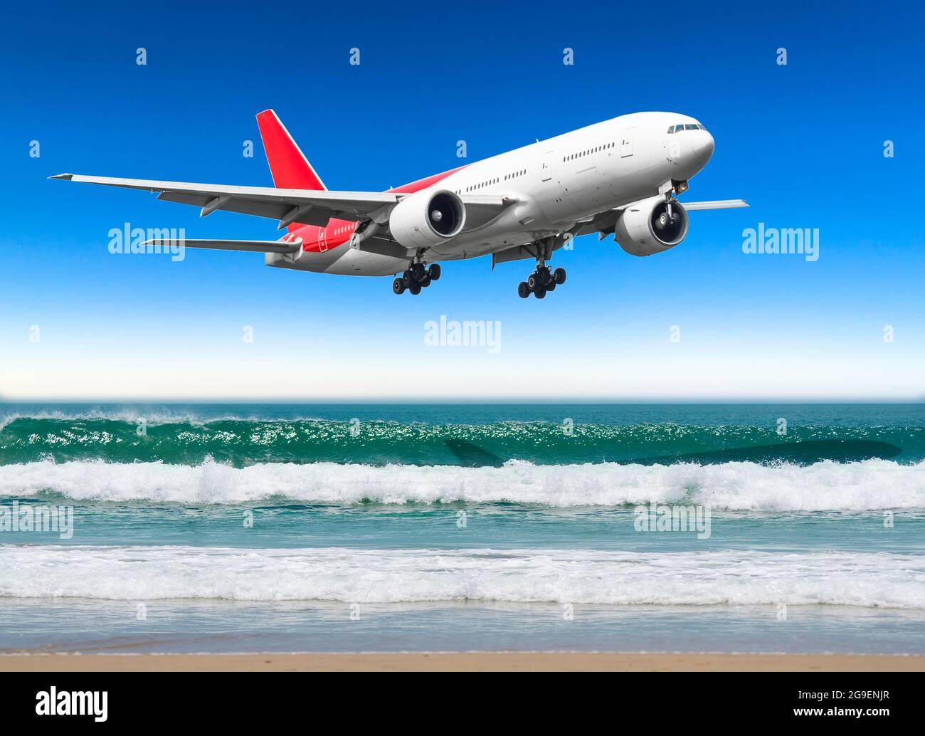 Airplane flying over amazing ocean landscape with tropical island ...