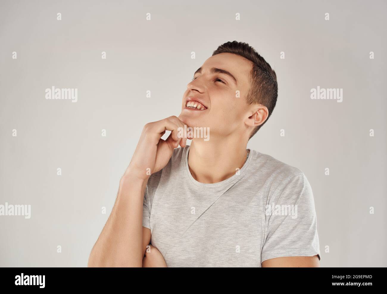 Cheerful man gesturing with hands studio cropped view fashion Stock ...