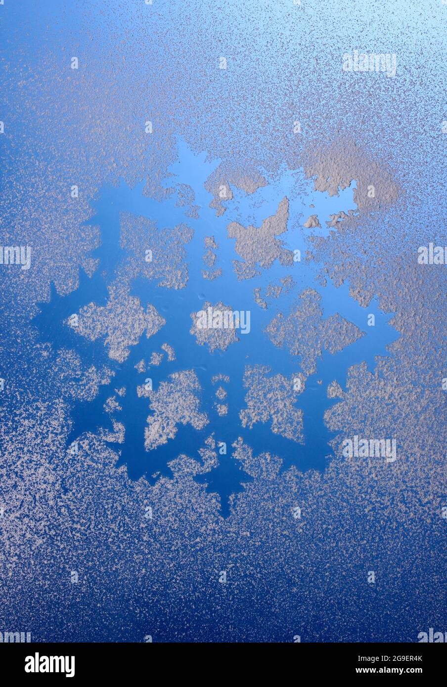 Snowflake pattern on window Stock Photo - Alamy