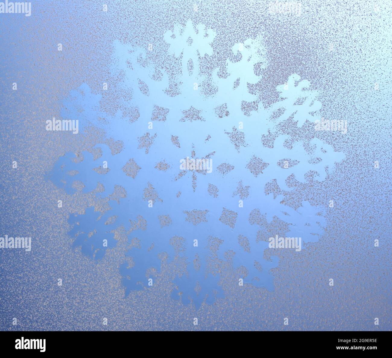 Snowflake pattern on window Stock Photo - Alamy
