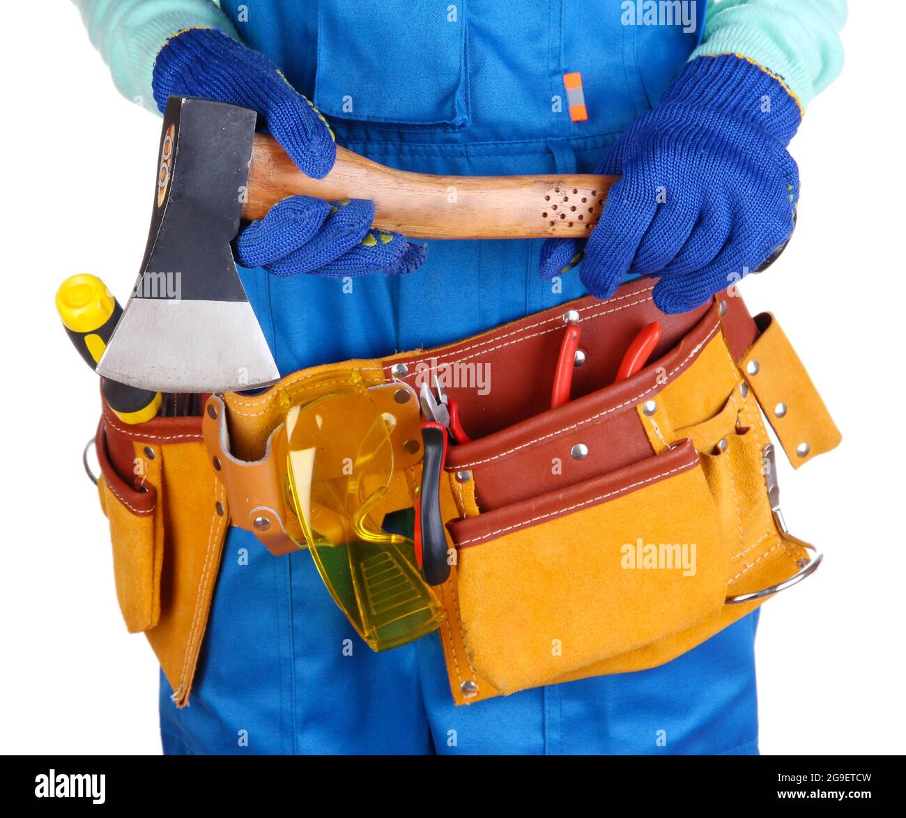 Male builder in blue overalls with hatchet isolated on white Stock ...