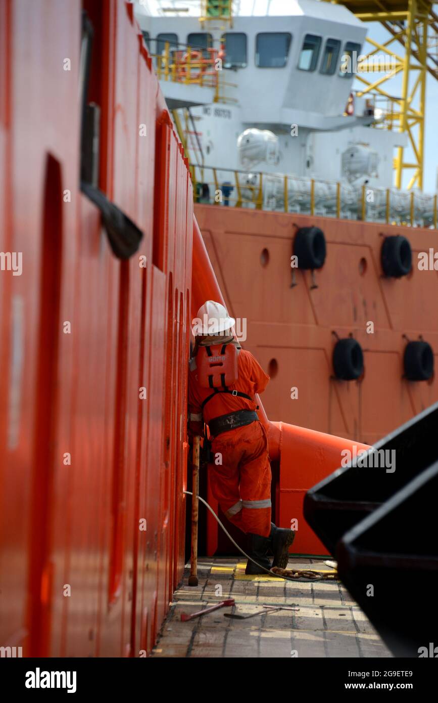 KEMAMAN,TERENGGANU - 12 April 2016, Marine crew commencing anchor job operation fon vessel deck ...