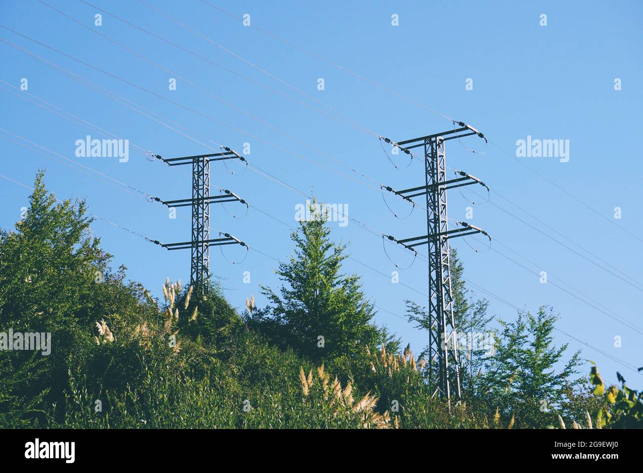 Low angle shot of electricity transmission pylons Stock Photo - Alamy