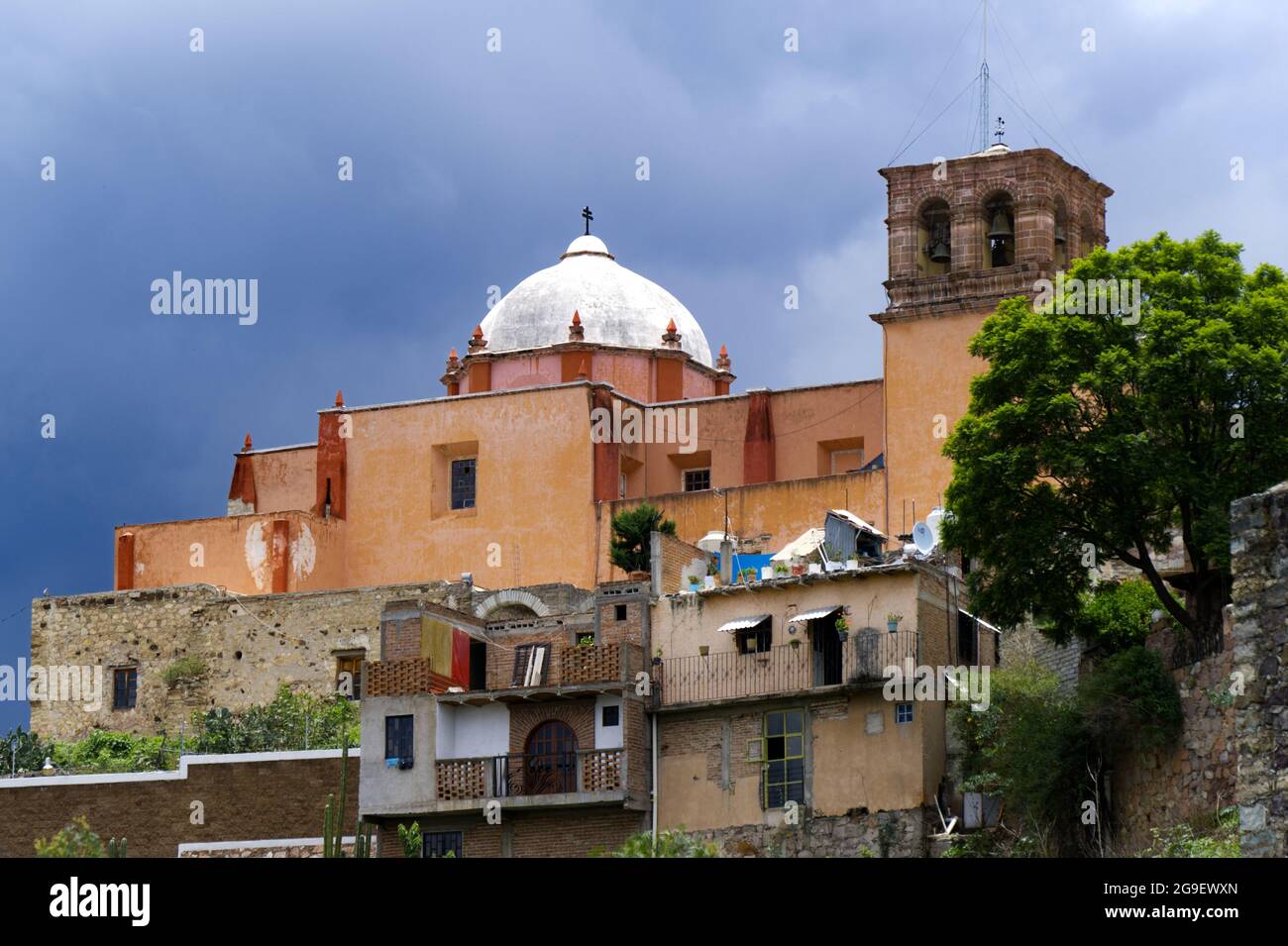 Guanajuato, Mexico - Church looming over Santa Domingo Stock Photo - Alamy