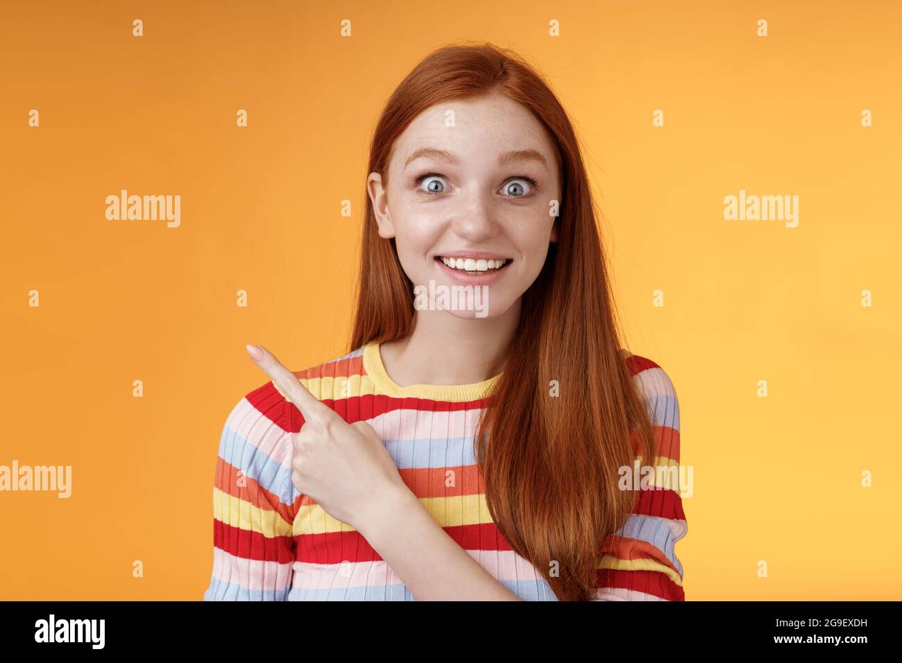 Excited Thrilled Good Looking Young Silly Redhead Girl Surprised Pop