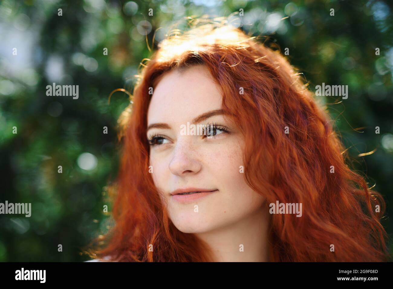 Redhead woman outdoors hi-res stock photography and images - Alamy