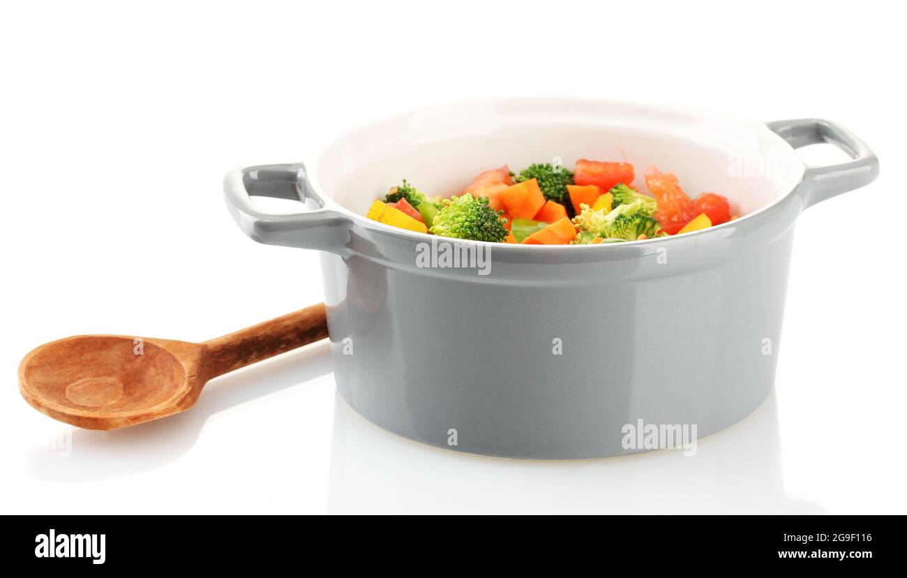 Vegetable stew in gray pot isolated on white Stock Photo - Alamy