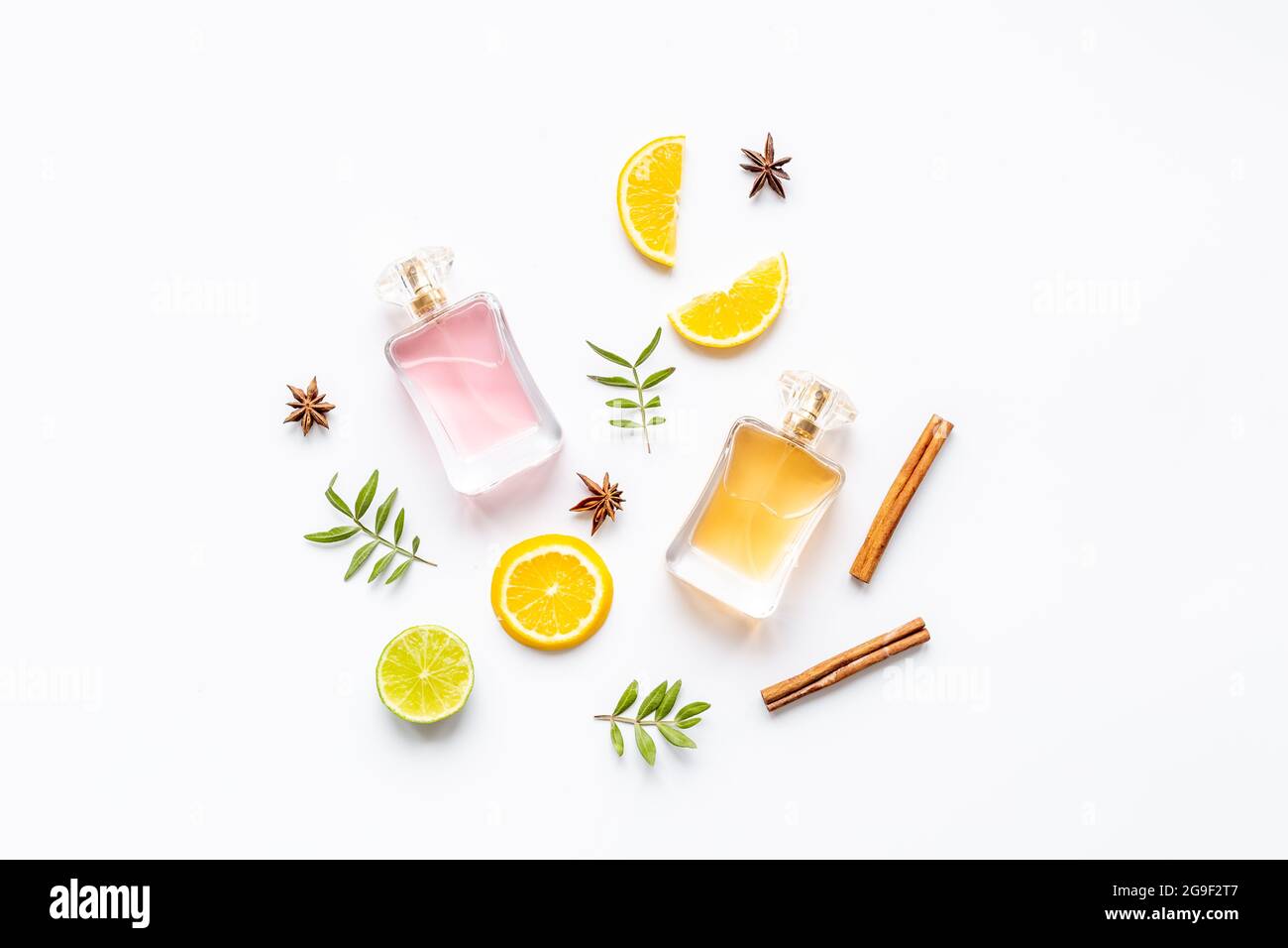 Perfume bottles flat lay. Perfumery cosmetics fragrance set Stock Photo ...