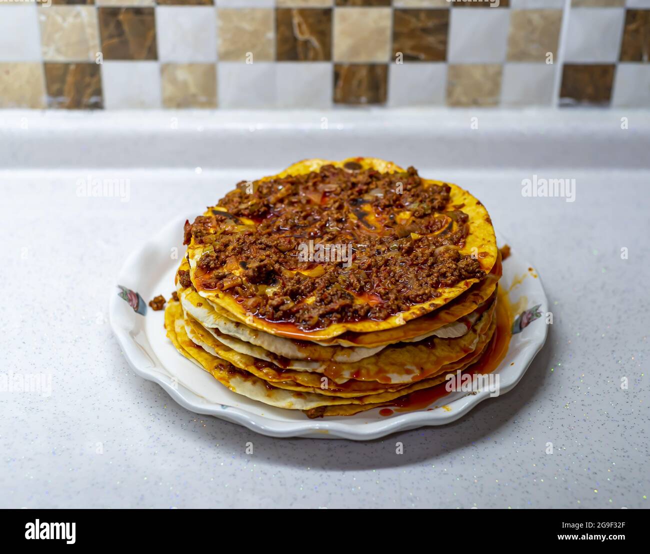 Turkish food Kayseri Yaglama with minced meat, yogurt, and tomato paste ...