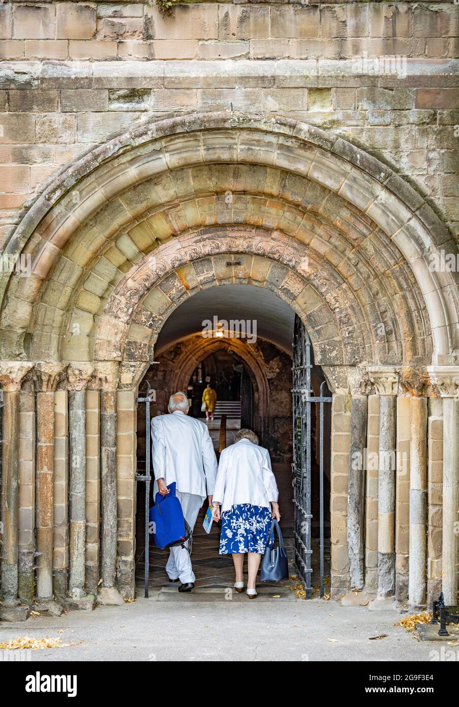 An elderly man and woman enter Worcester Cathedral's southern entrance ...