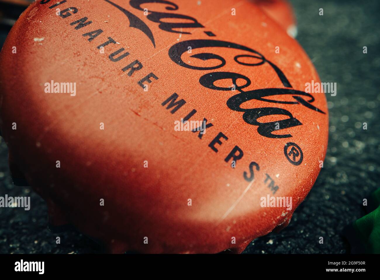 KRASNODAR, RUSSIA - NOVEMBER 9, 2020: Macro photo of Coca Cola lids on ...