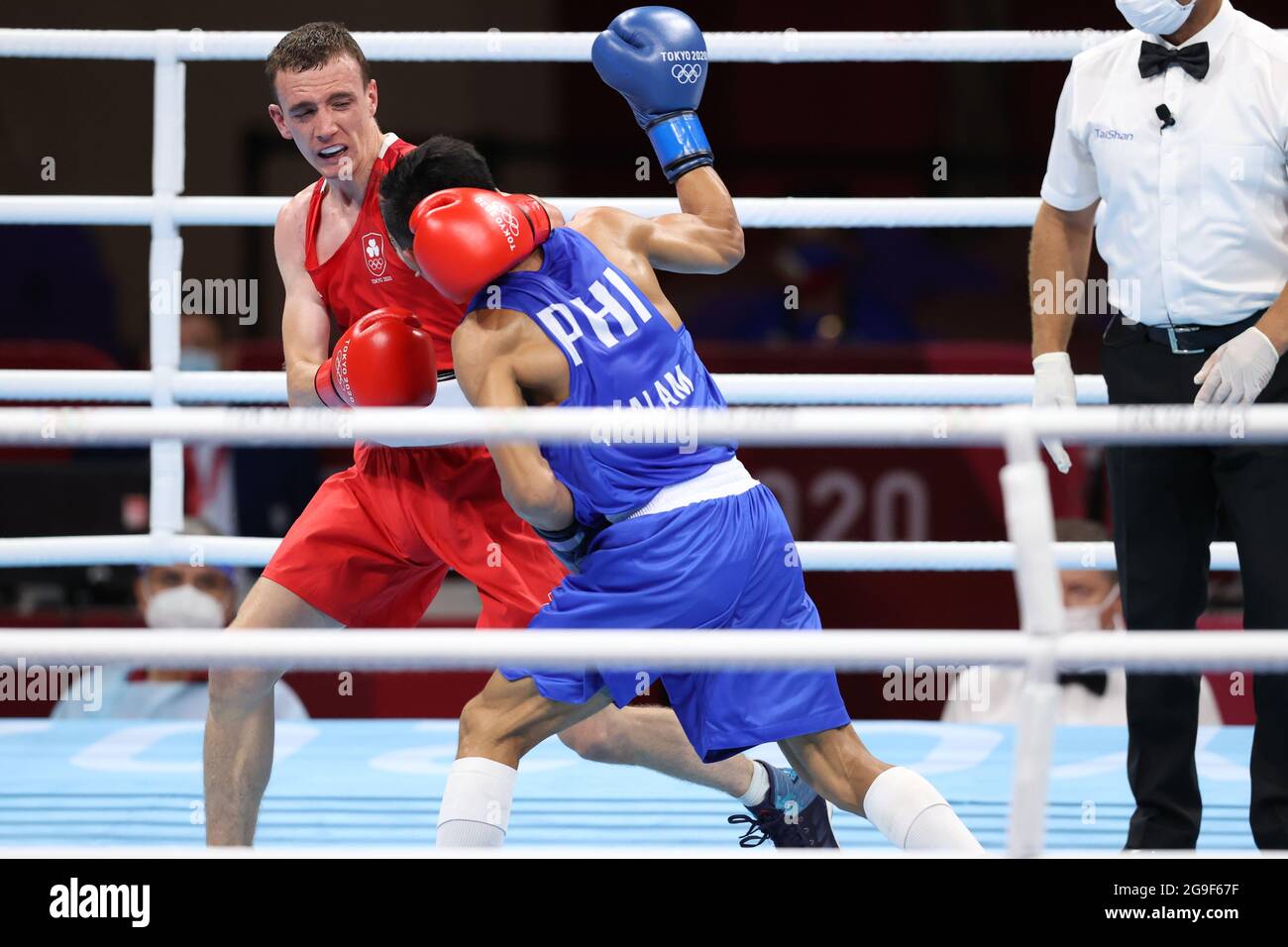 Tokyo, Japan. 26th July, 2021. IRVINE Brendan (IRL) in red fights ...