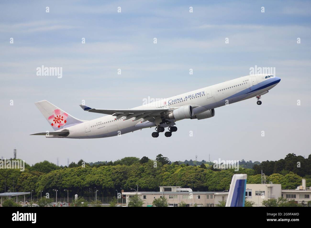 TOKYO, JAPAN - MAY 12, 2012: China Airlines Airbus A330 taking off from ...
