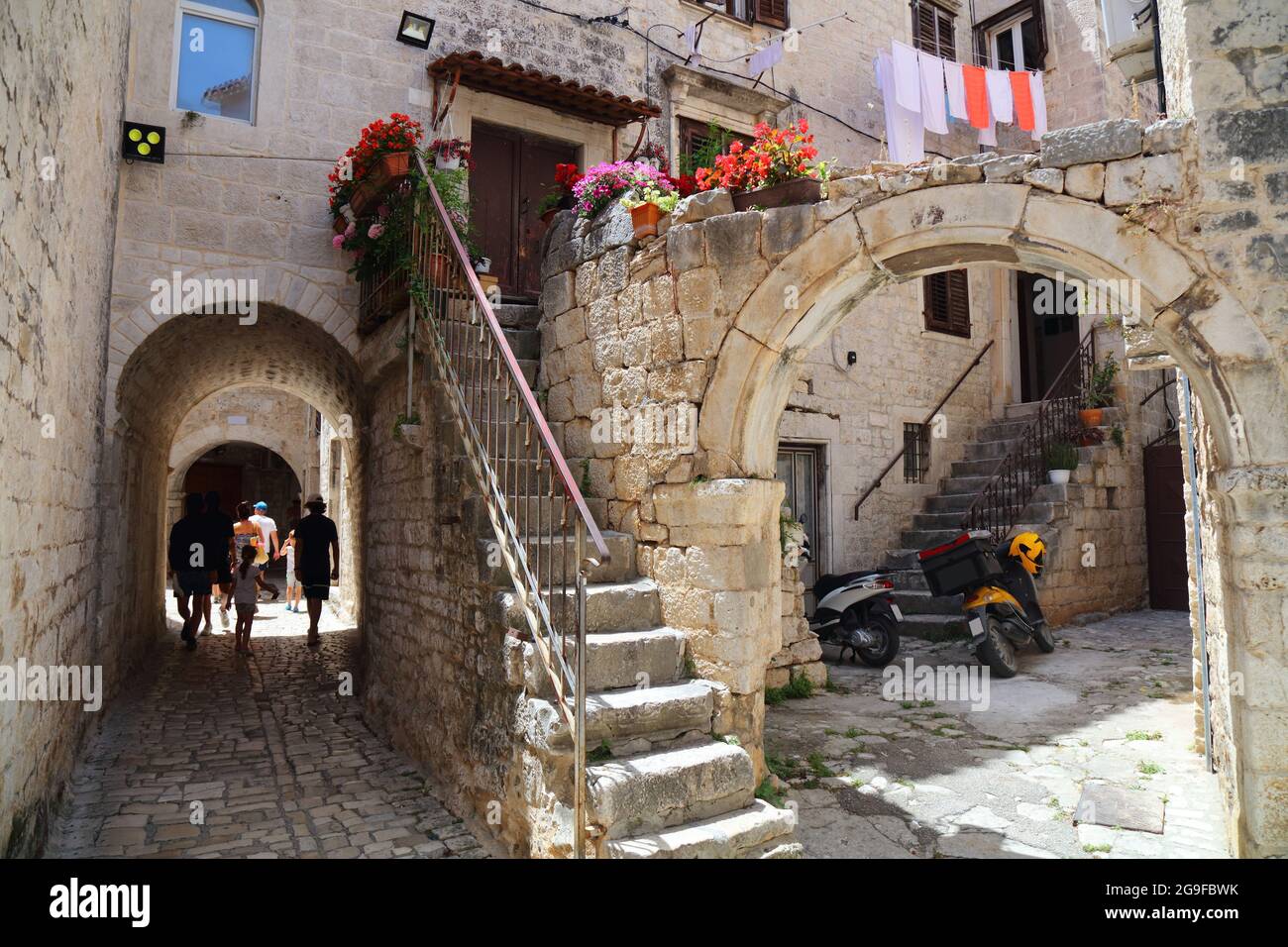 Streets of Trogir old town in Croatia. Narrow quaint alleys in Croatia ...