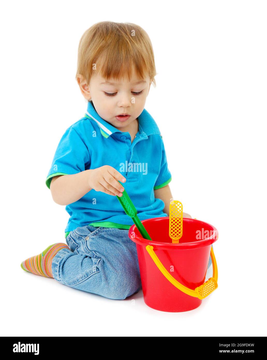 cute little boy with toy bucket, isolated on white Stock Photo - Alamy