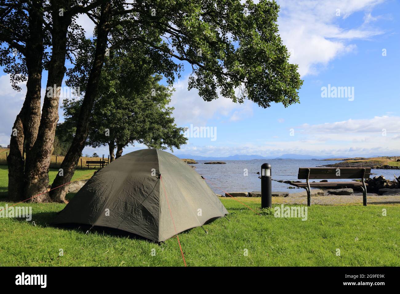 Norway campsite with small tent. Rennesoy island outdoor vacation ...