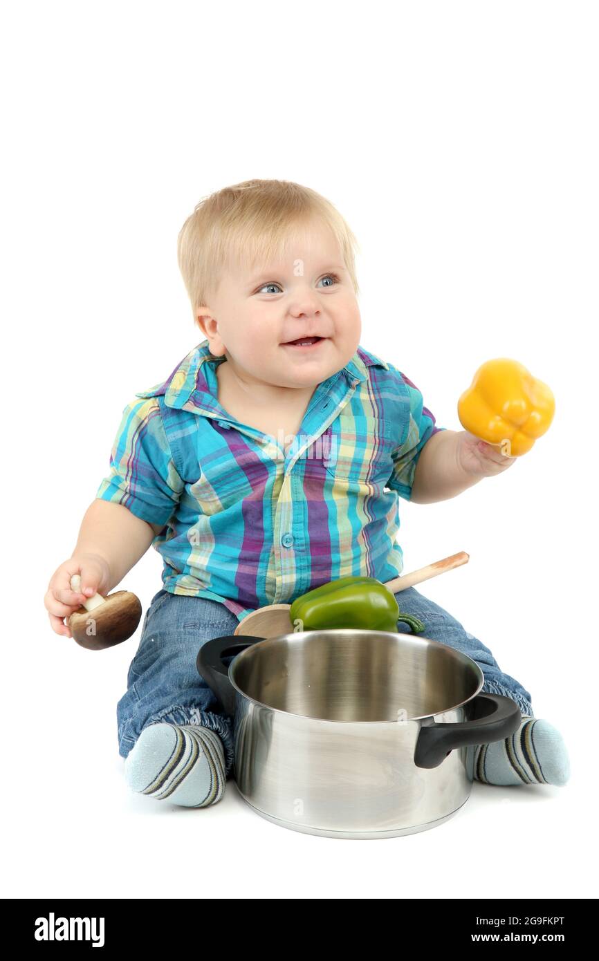 Little boy with pan and vegetables, isolated on white Stock Photo - Alamy