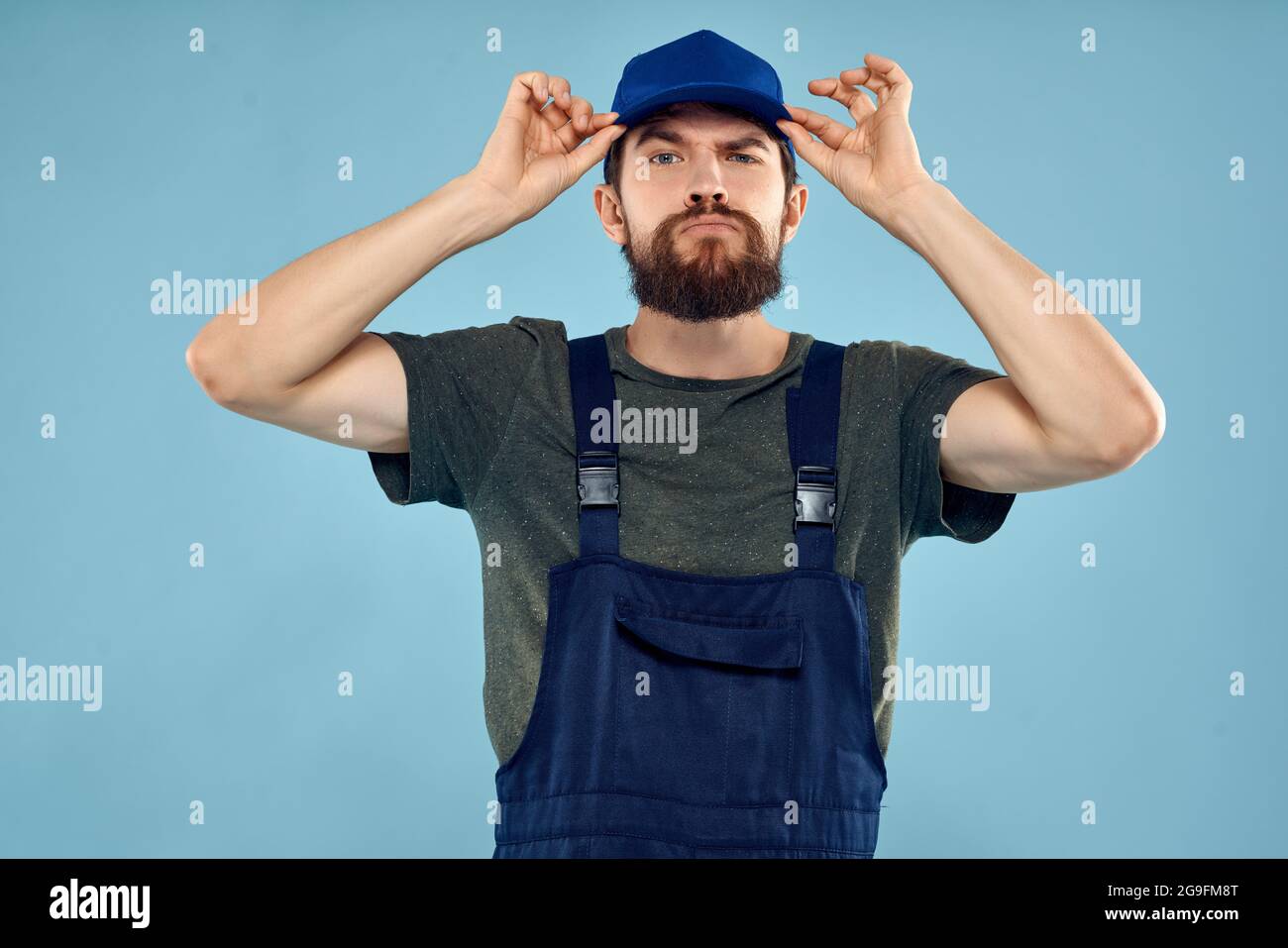 man blue work uniform professional delivery emotion service Stock Photo ...
