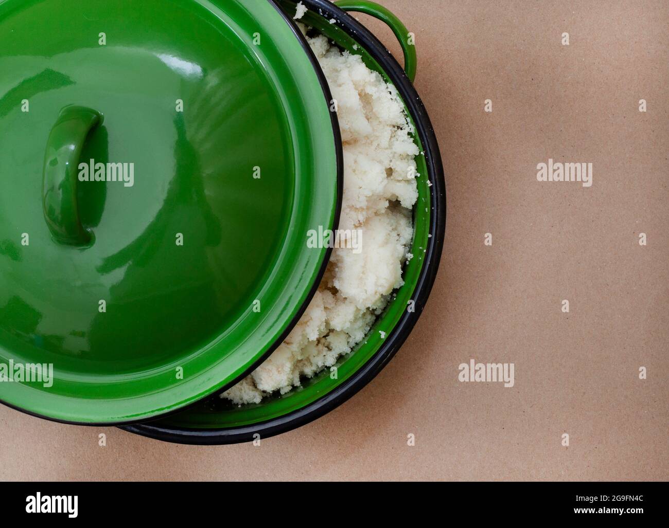 Traditional South African Maize meal in rustic green pot Stock Photo ...