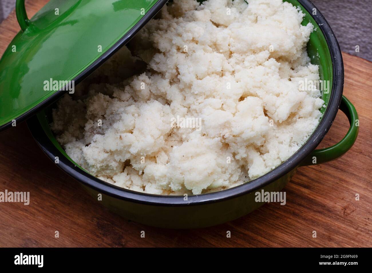 Traditional South African Maize meal in rustic green pot Stock Photo ...