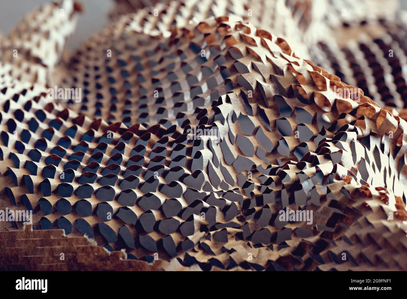 Abstract background with perforated wrapping paper Stock Photo - Alamy