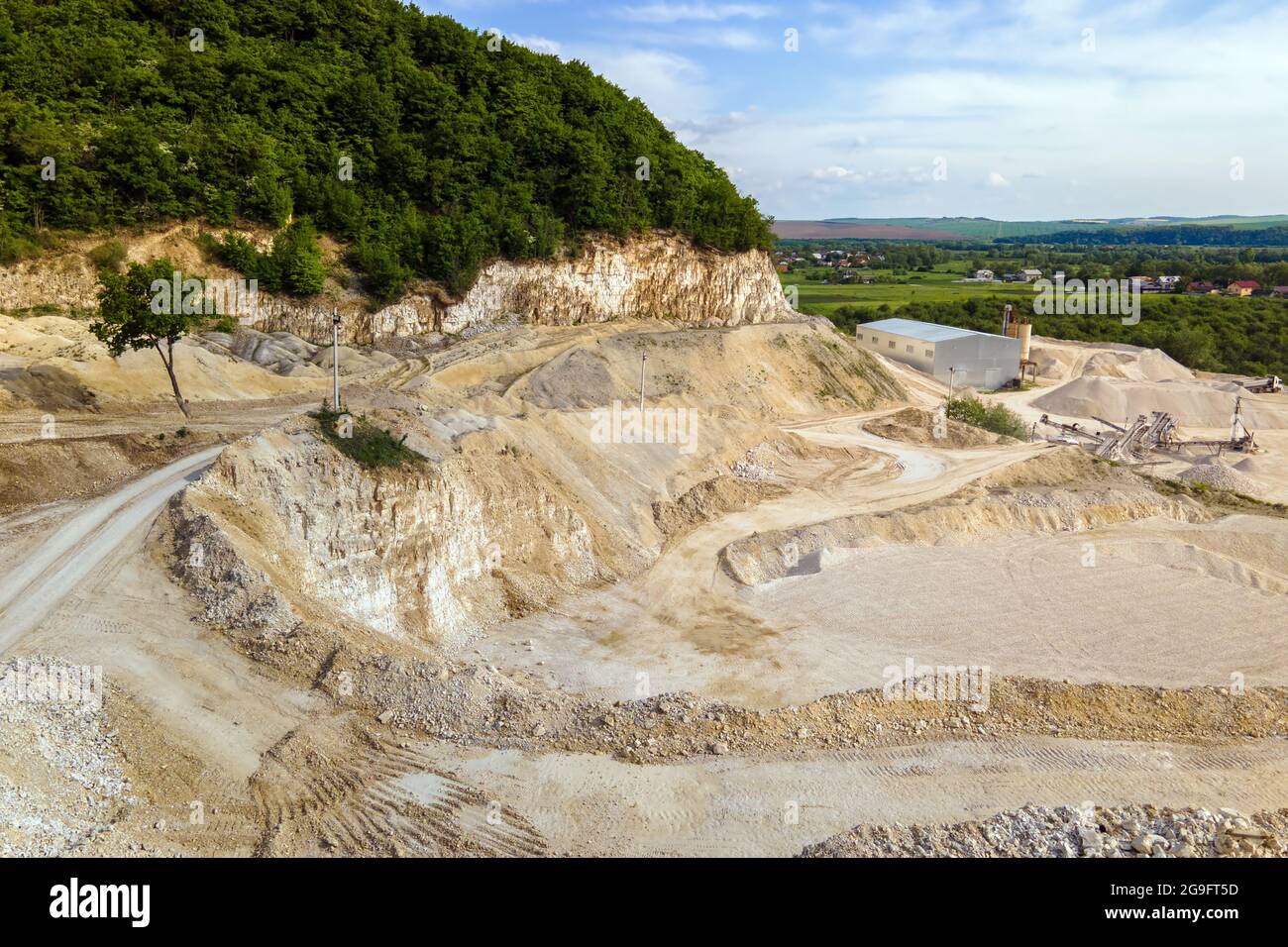 Open pit mining of construction sand stone materials Stock Photo - Alamy