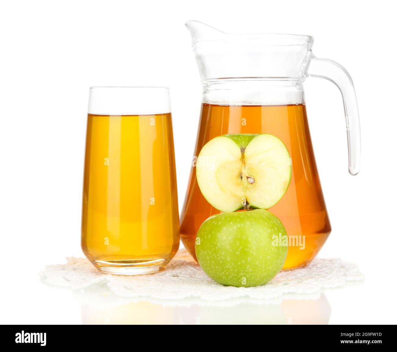 Full glass and jug of apple juice and apples isolted on white Stock ...