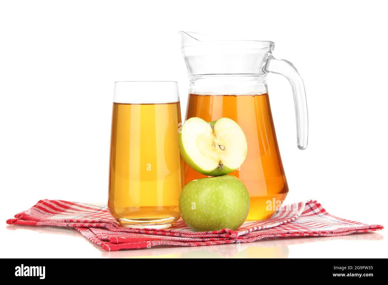 Full glass and jug of apple juice and apples isolted on white Stock ...
