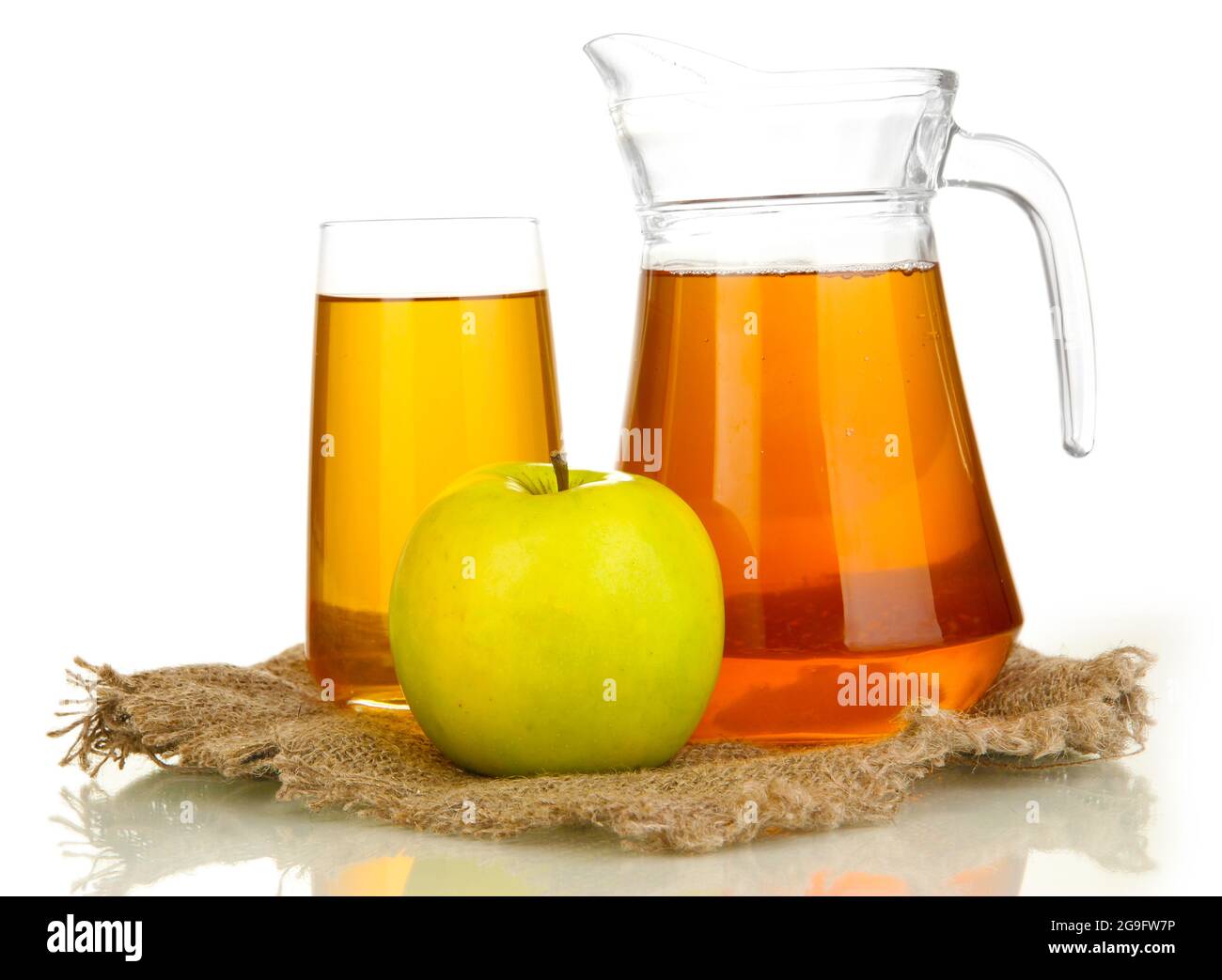 Full glass and jug of apple juice and apple isolted on white Stock ...