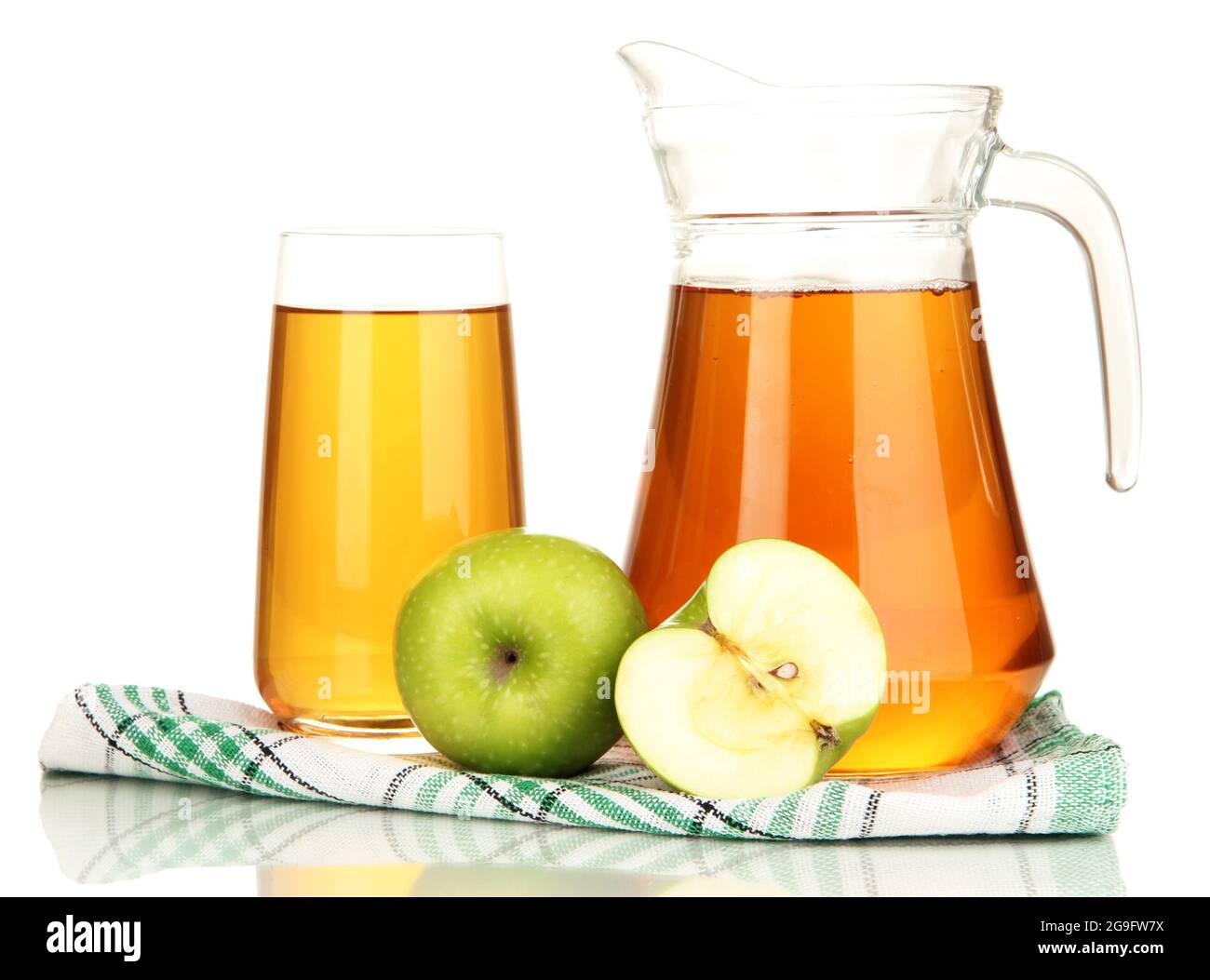 Full glass and jug of apple juice and apples isolted on white Stock ...