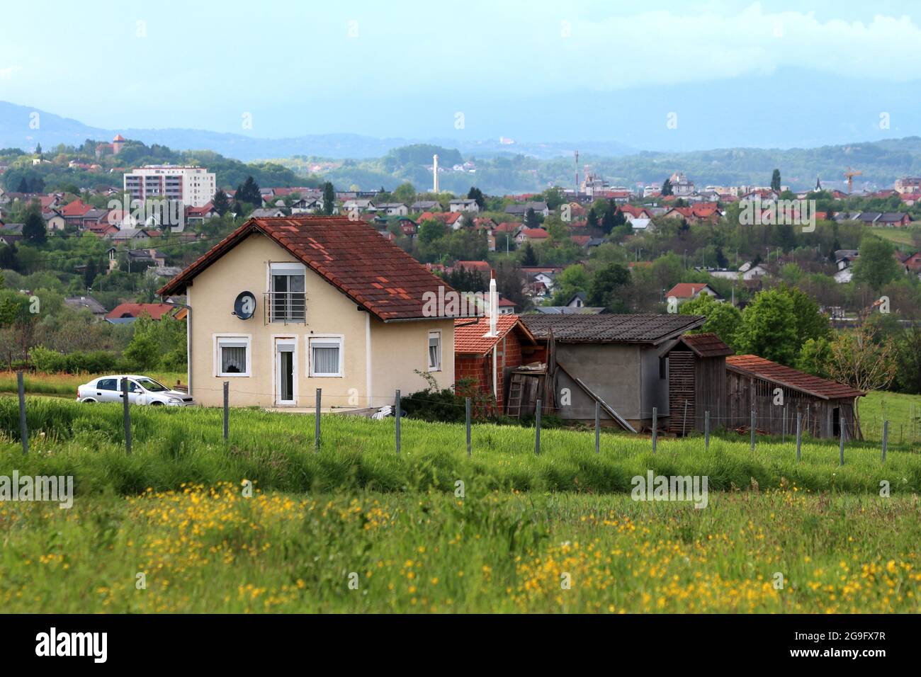 Landscape view of idyllic small country town spreading into distance ...