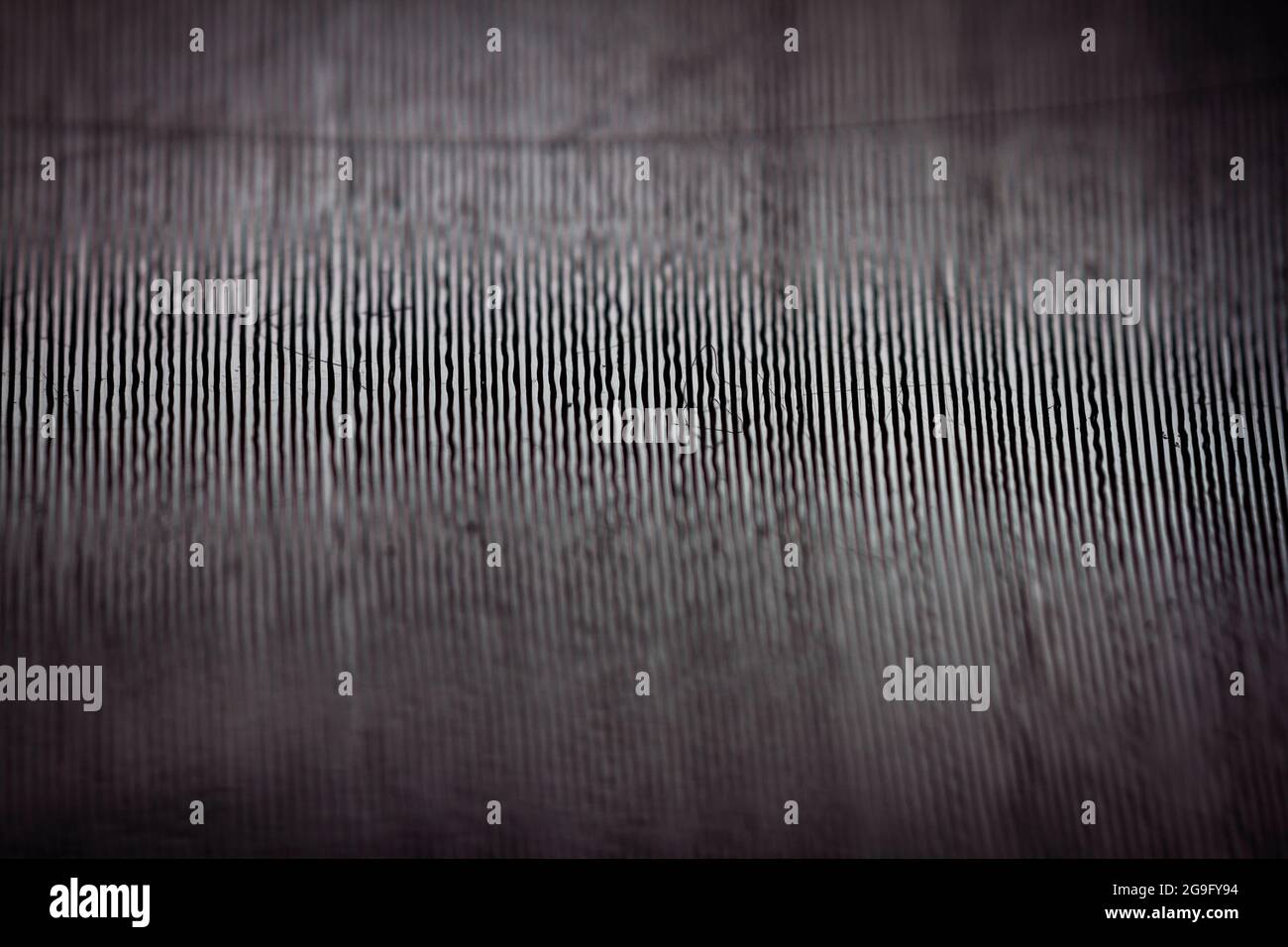 Macro shot of black vinyl record showing scratches. Surface of an old ...