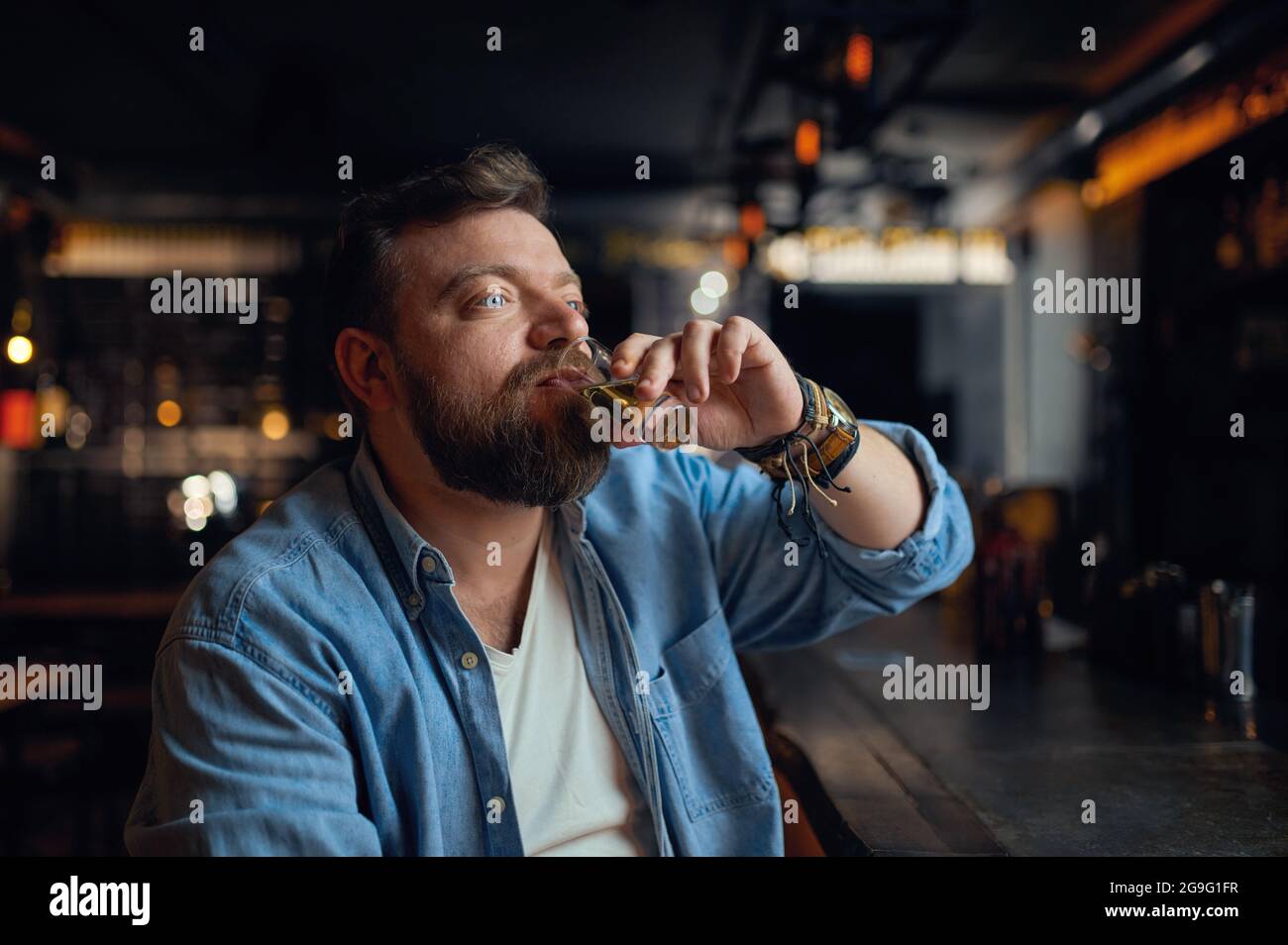 Man drinks alcohol hi-res stock photography and images - Alamy