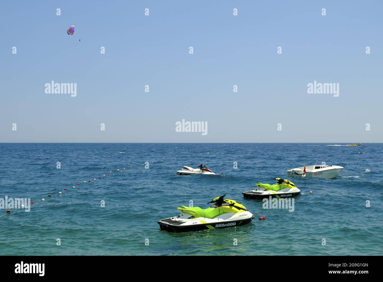 ANTALYA, TURKEY - Jul 16, 2021: A view at Jetskis and parasailing at ...