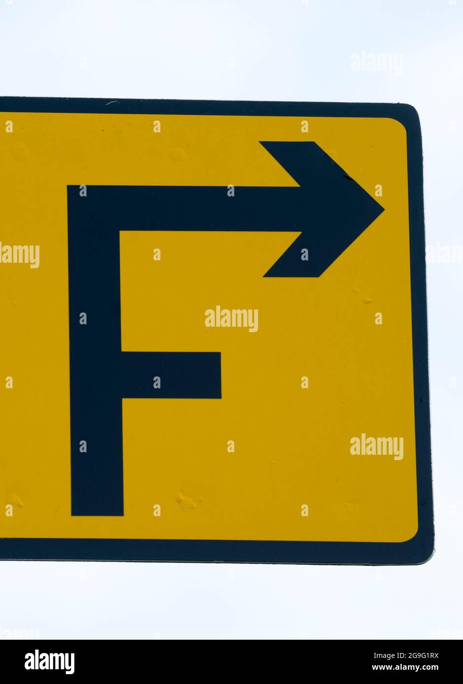 Part of a property development road sign that looks like a letter F ...