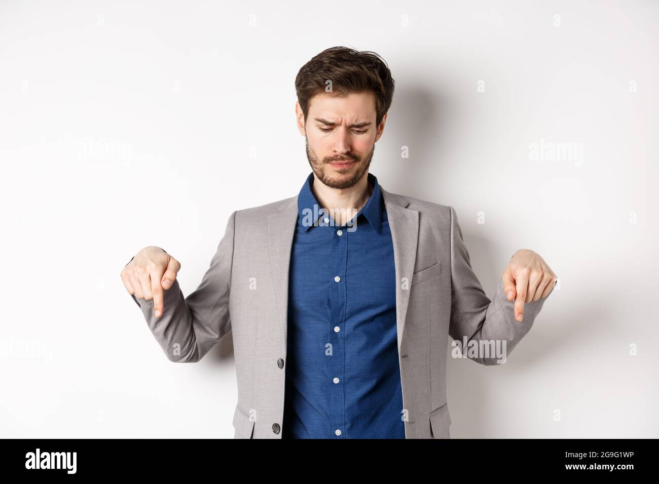 Unimpressed Man Suit High Resolution Stock Photography and Images - Alamy