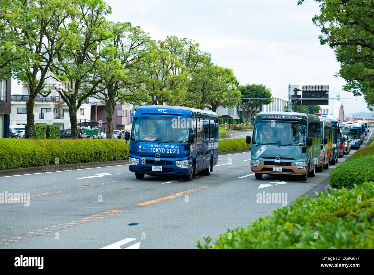 Tokyo 2020 Olympic Torch Relay. Car parade with partners and sponsors ...