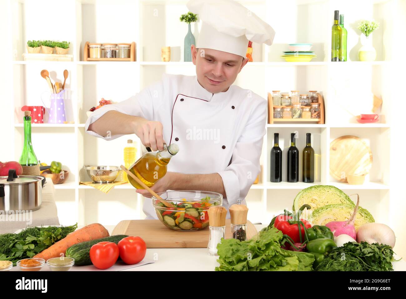 Chef cooking in kitchen Stock Photo - Alamy