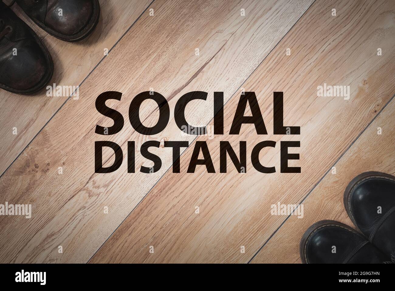 two people keep spaced between each other for social distancing ...