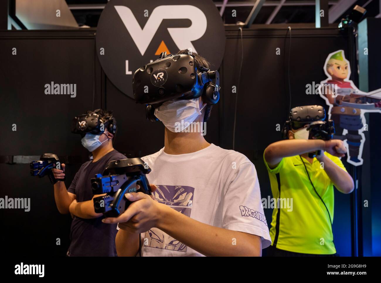 Visitors play Virtual Reality (VR) games during the Ani-com & Games ...