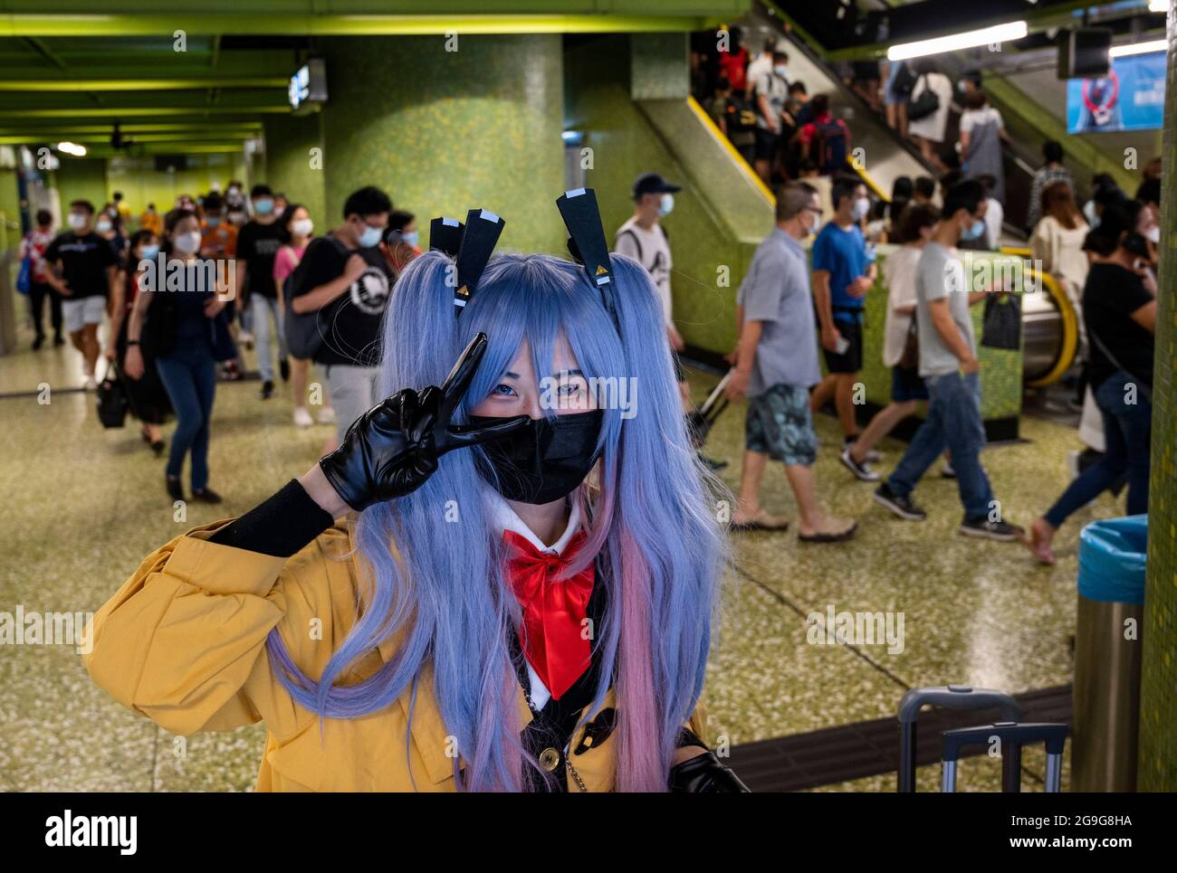 A dressed-up cosplayer is seen at subway station before arriving at the ...