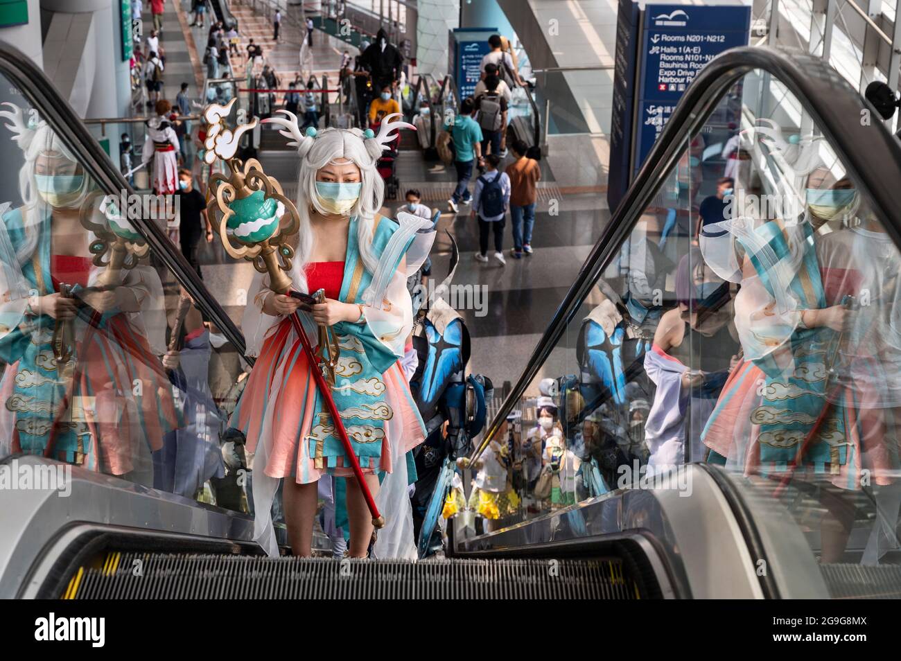 A participant dressed-up cosplayer is seen during the Ani-com & Games ...