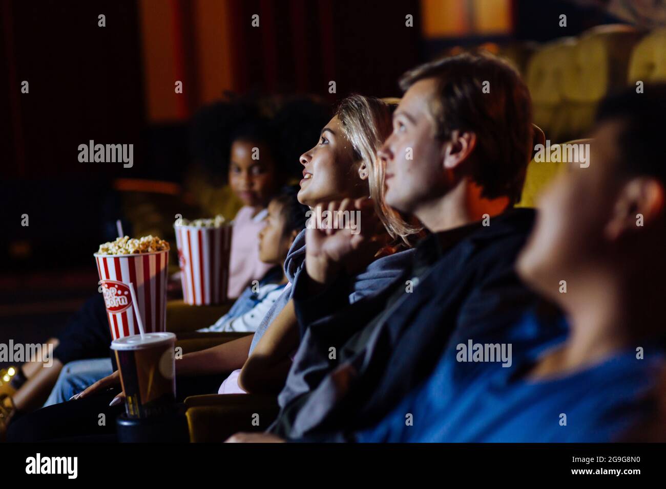 Kids watching movie cinema hi-res stock photography and images - Alamy