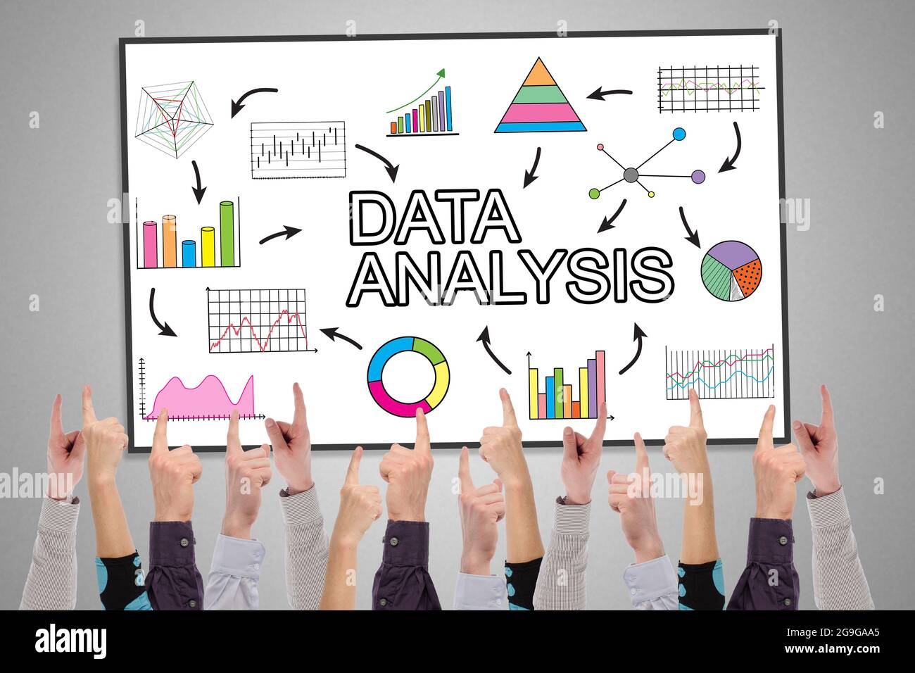 Data analysis concept on a whiteboard pointed by several fingers Stock ...