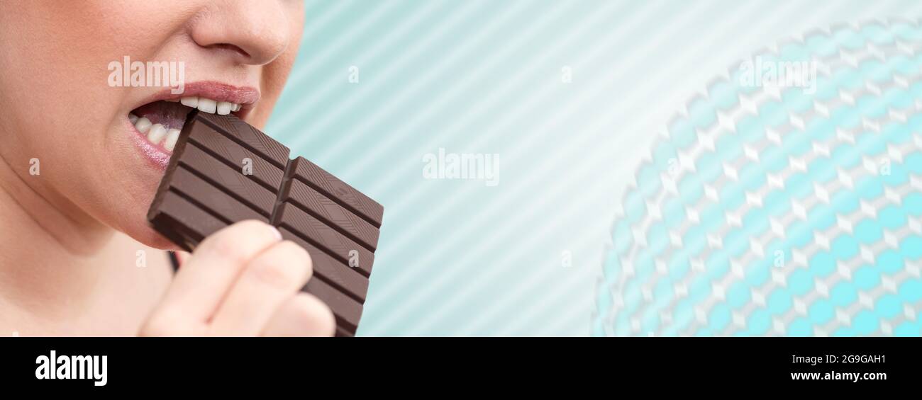 Close up of woman biting in a chocolate bar on abstract background ...